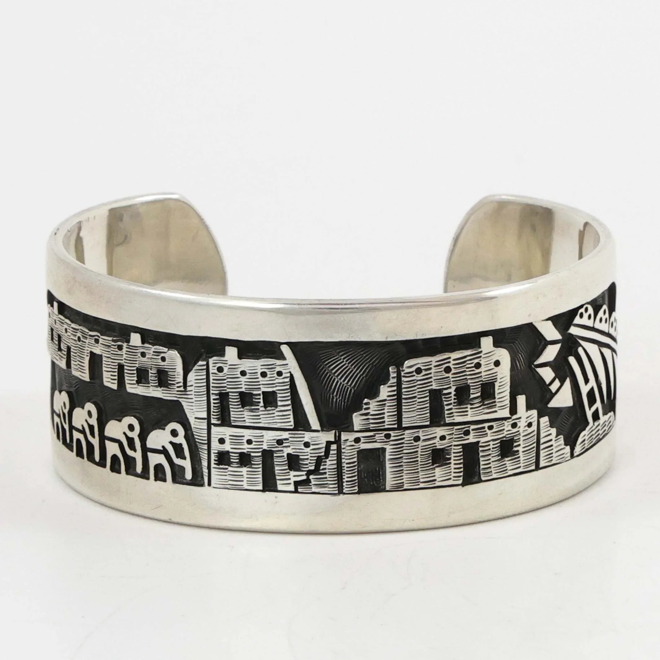 Flute Player and Village Cuff – Garland's