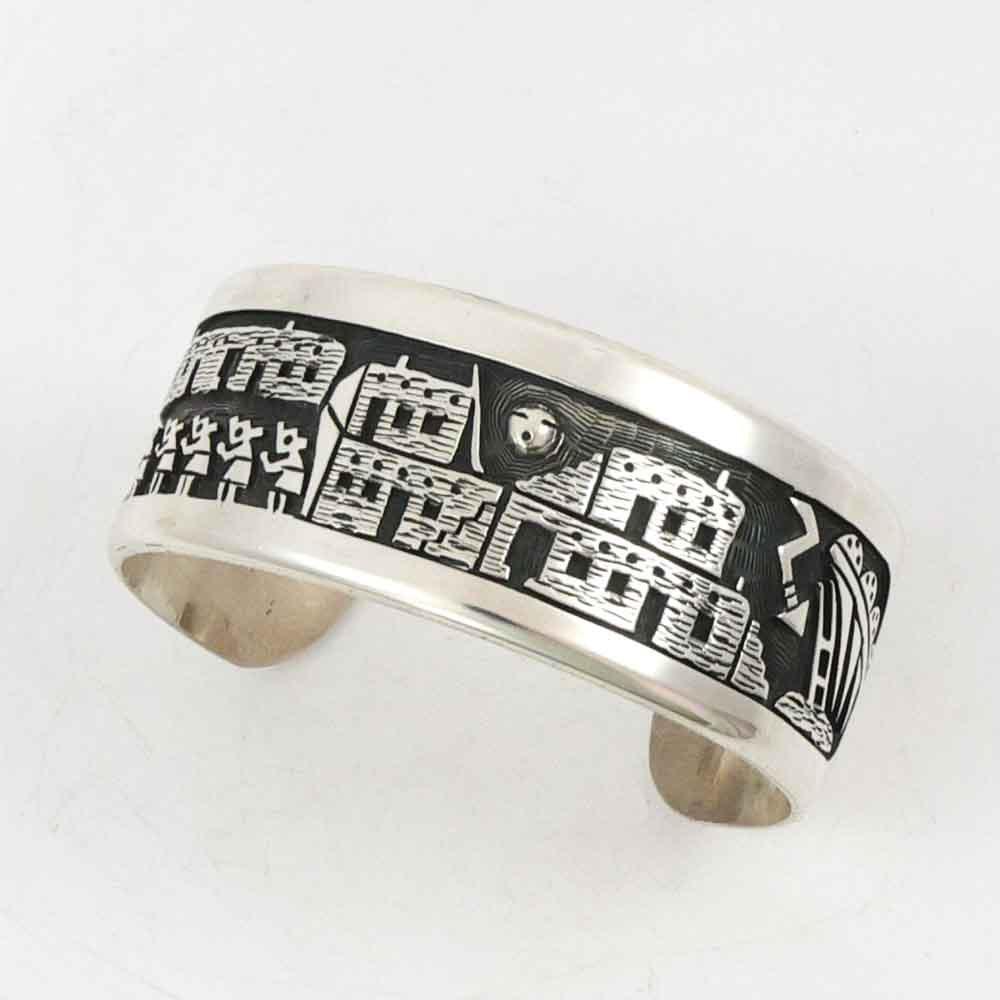 Flute Player and Village Cuff – Garland's